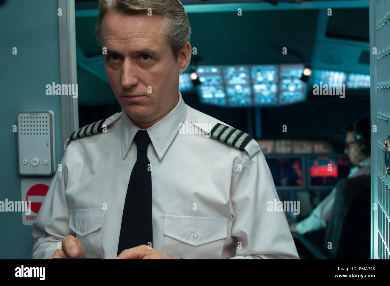 LINUS ROACHE as the plane's captain, David McMillan, in "Non-Stop ...