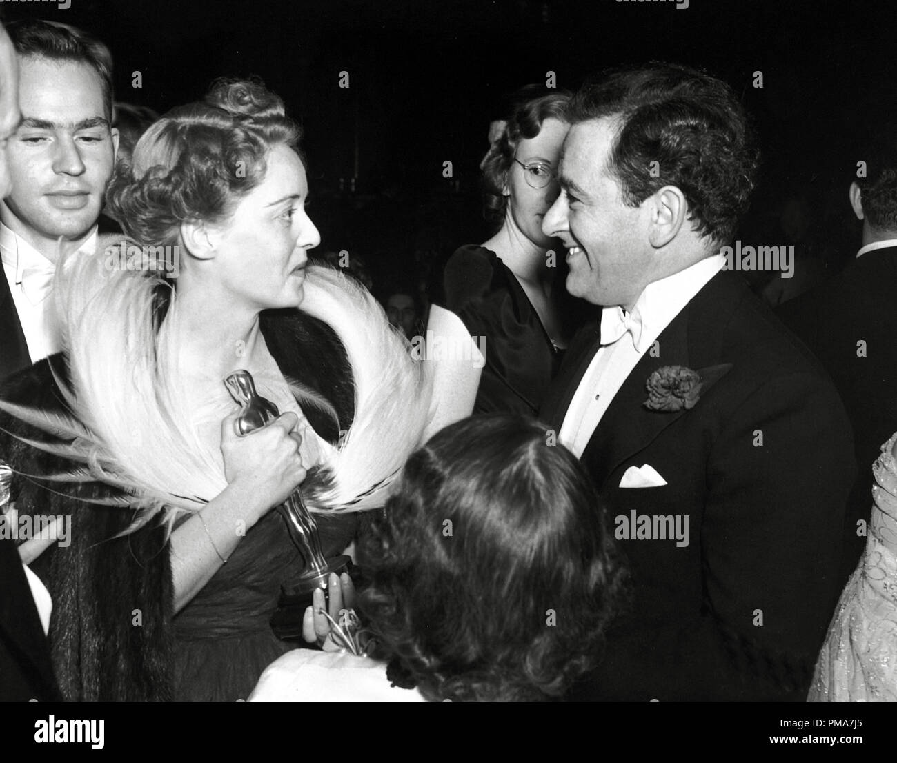 Bette Davis, William Wyler at the 11th Annual Academy Awards, 1939 File ...