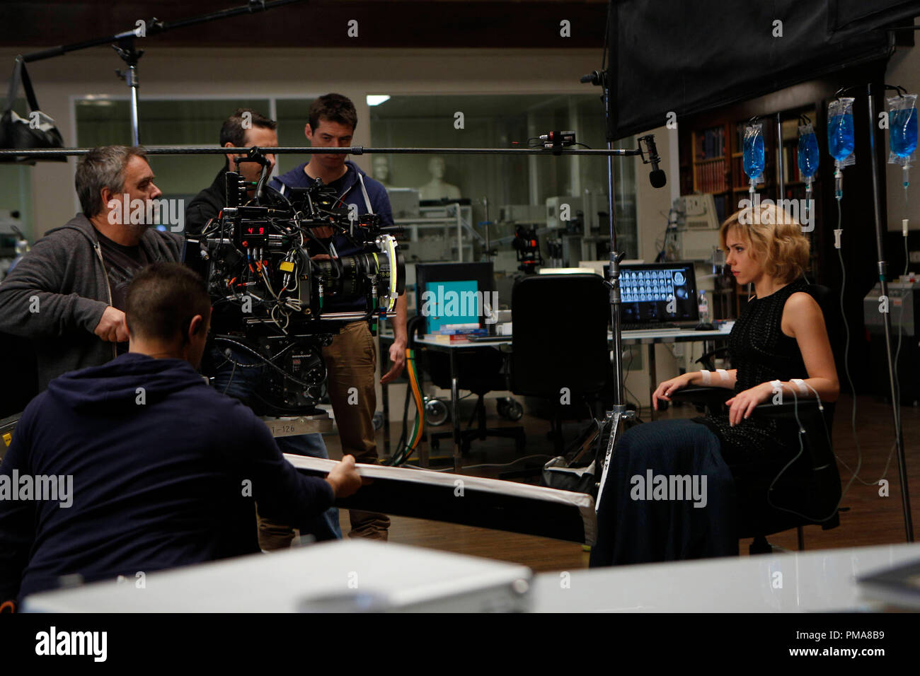 Writer/director LUC BESSON and SCARLETT JOHANSSON as Lucy on the set of ...
