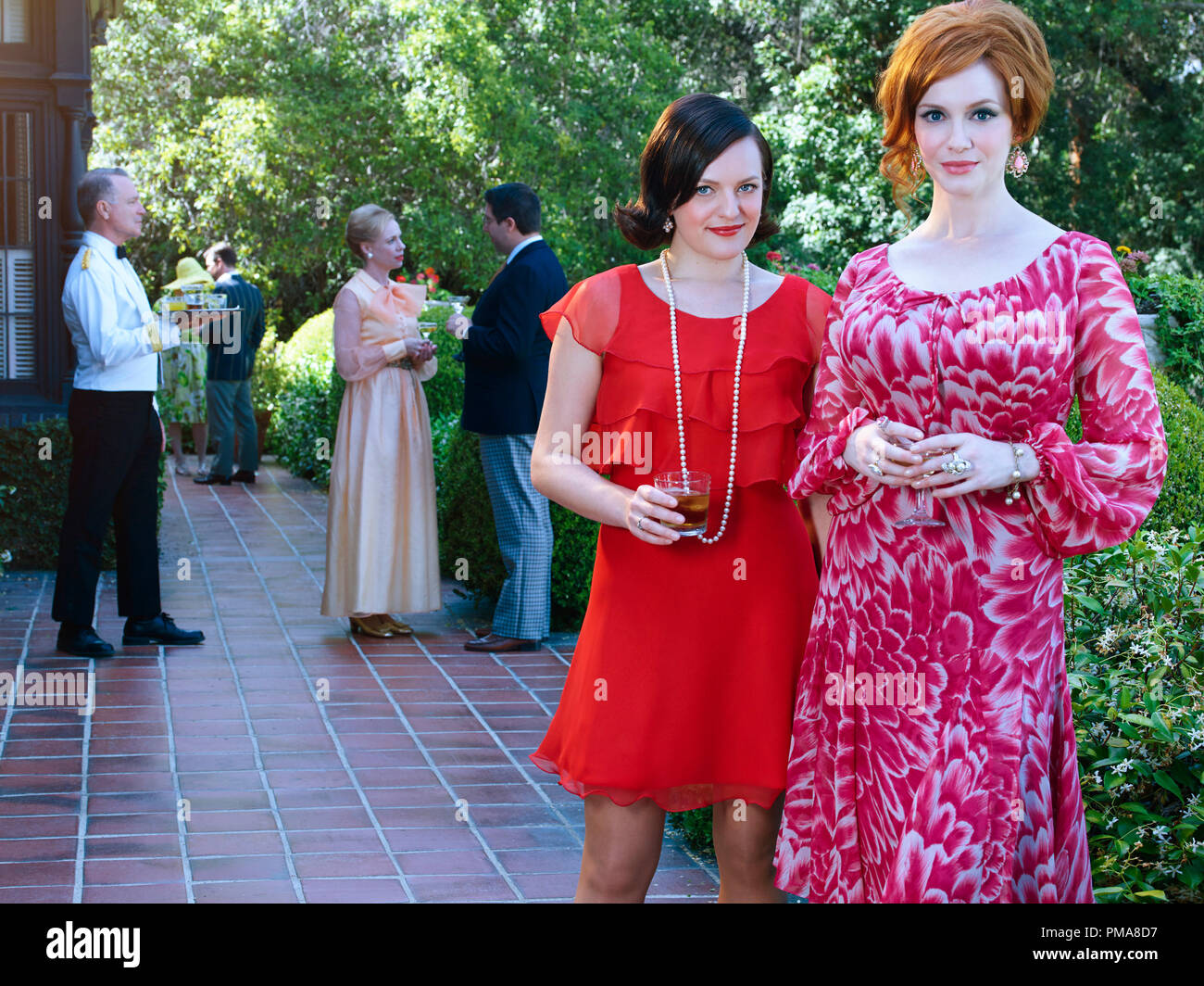 Elisabeth Moss as Peggy Olson and Christina Hendricks as Joan Harris ...