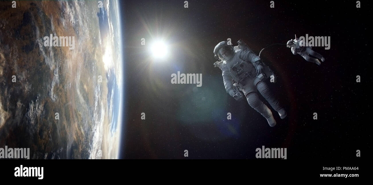 SANDRA BULLOCK as Ryan Stone and GEORGE CLOONEY as Matt Kowalski in ...