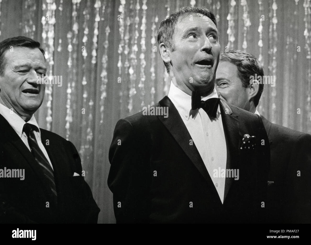 John Wayne, Dick Martin and Dan Rowan on the set of "Laugh-In ...