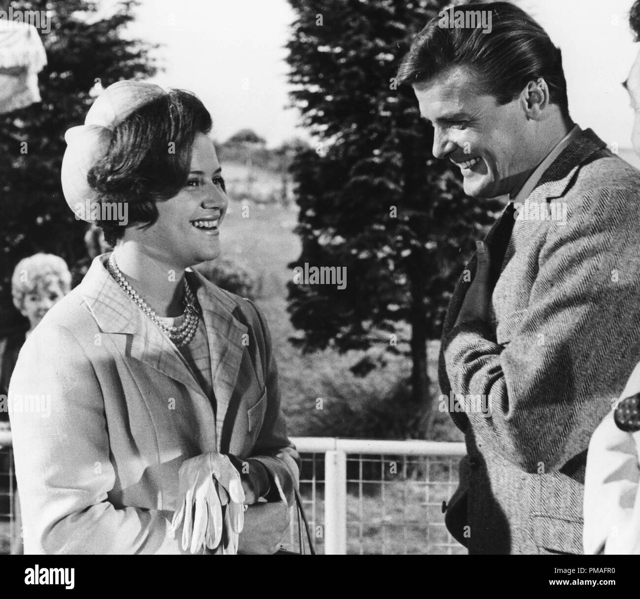 Princess Muna with Roger Moore during her visit to Elstree Studios ...