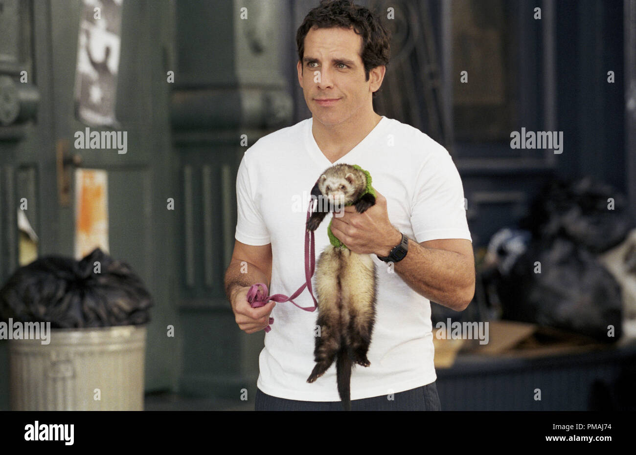 BEN STILLER as Reuben Feffer (holding Rodolpho, Polly's pet ferret) in ...