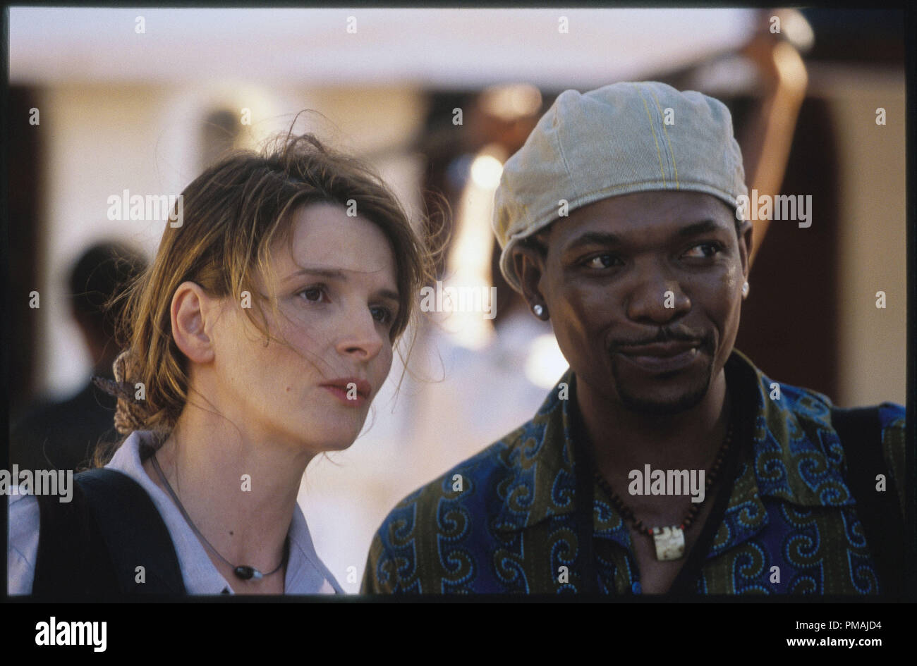 Left: Juliette Binoche as Anna Malan Right: Menzi "Ngubs" Ngubane as ...