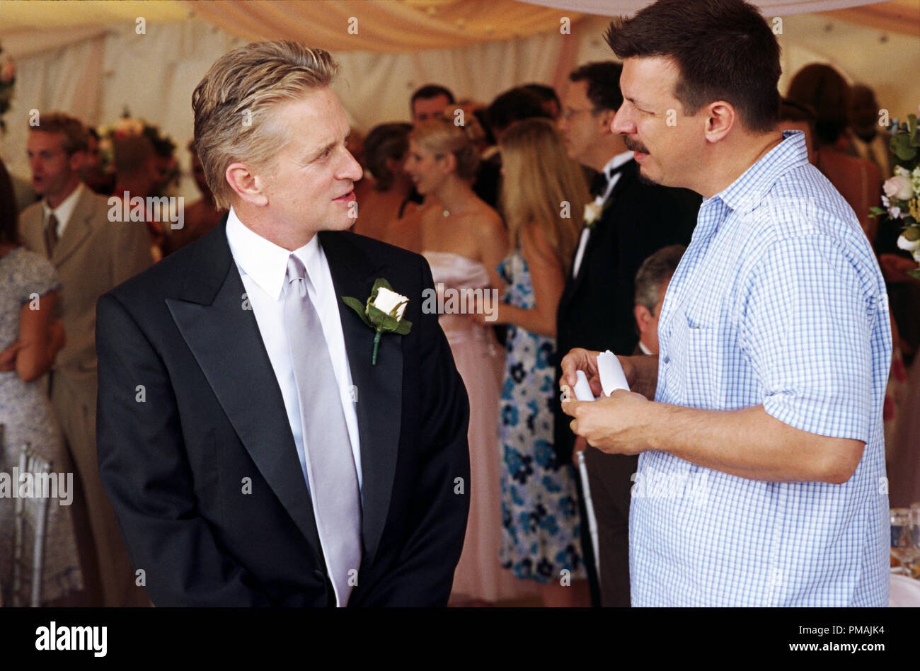 MICHAEL DOUGLAS and director ANDREW FLEMING on the set of Franchise ...
