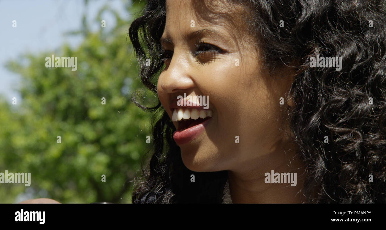 Closeup of African American woman smiling Stock Photo - Alamy