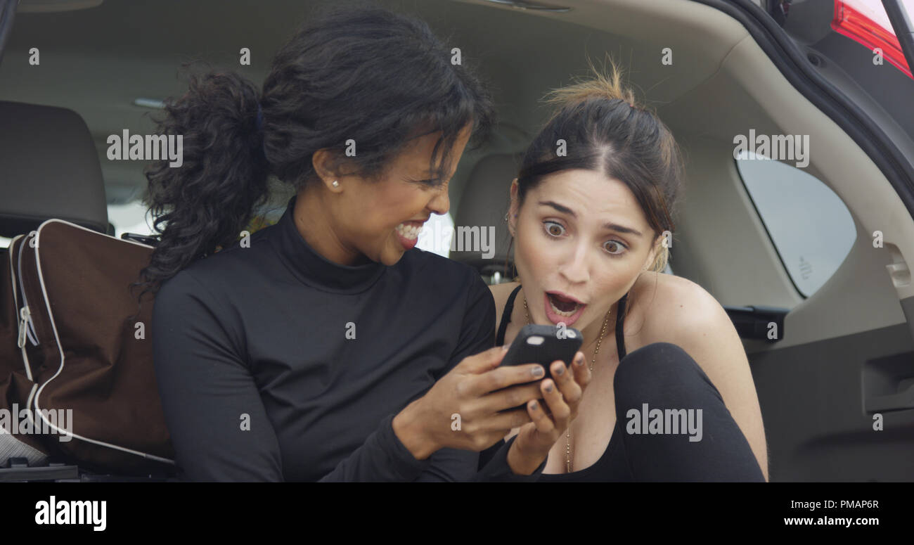 Mexican woman shocked by what she sees on smartphone Stock Photo - Alamy