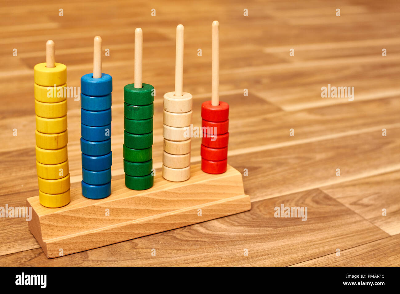 Wood color abacus Stock Photo - Alamy