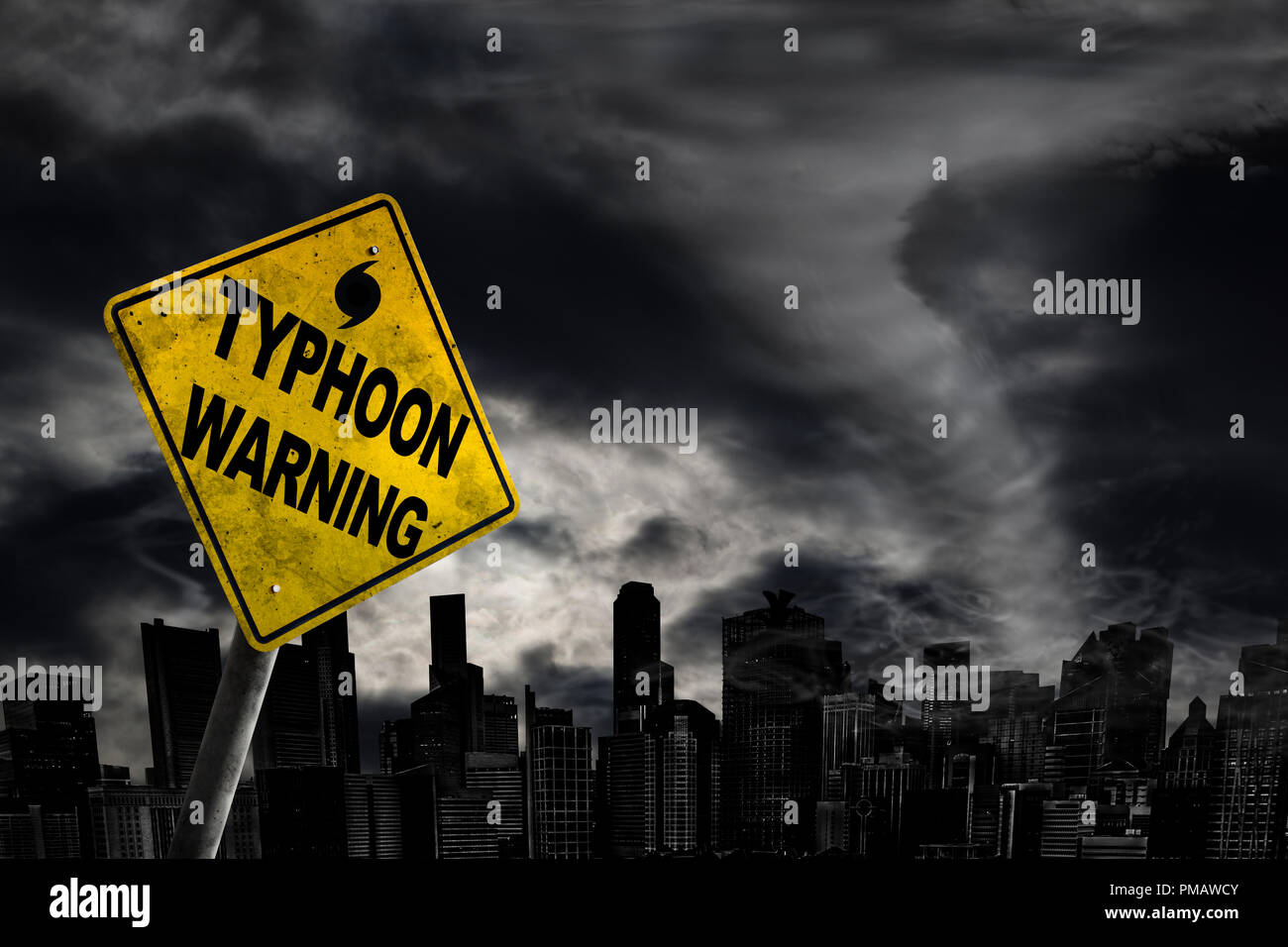 Typhoon warning sign against a powerful stormy background with city ...