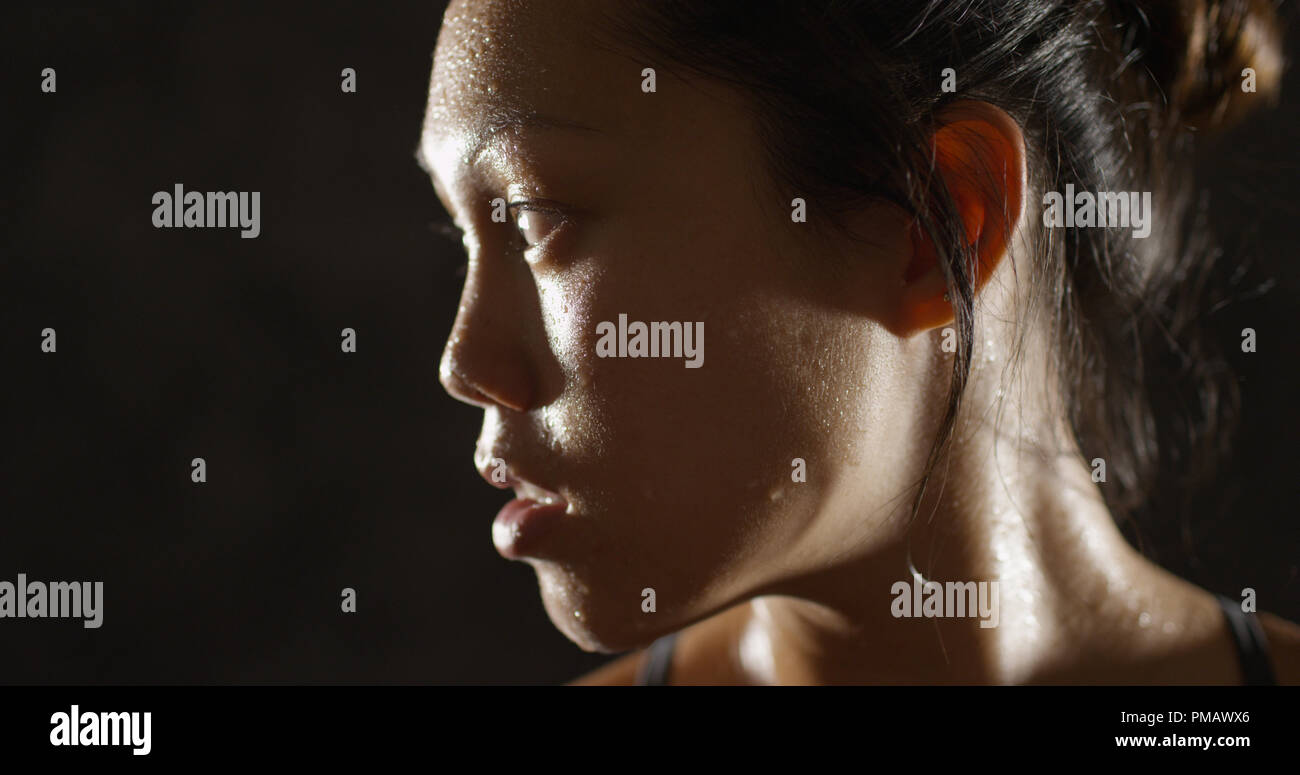 Healthy fit woman sweating taking a break from exercise Stock Photo - Alamy
