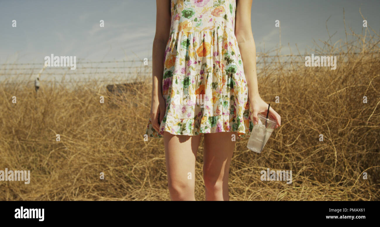 Portrait of cute young white girl standing in nature Stock Photo - Alamy