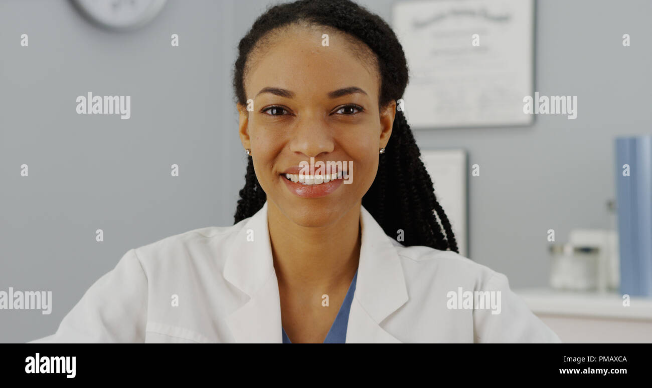 Beautiful female doctor glasses sitting hi-res stock photography and ...