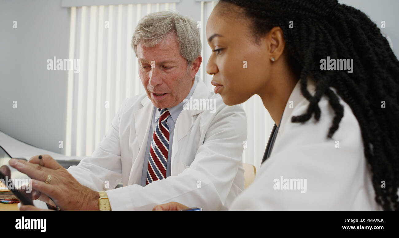 Two doctors working together Stock Photo - Alamy