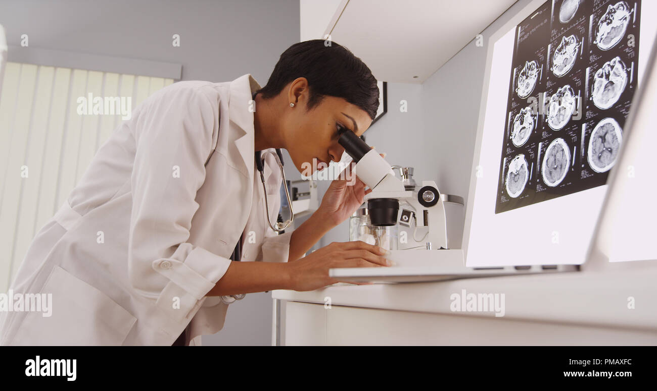 Black Doctor Microscope High Resolution Stock Photography and Images ...
