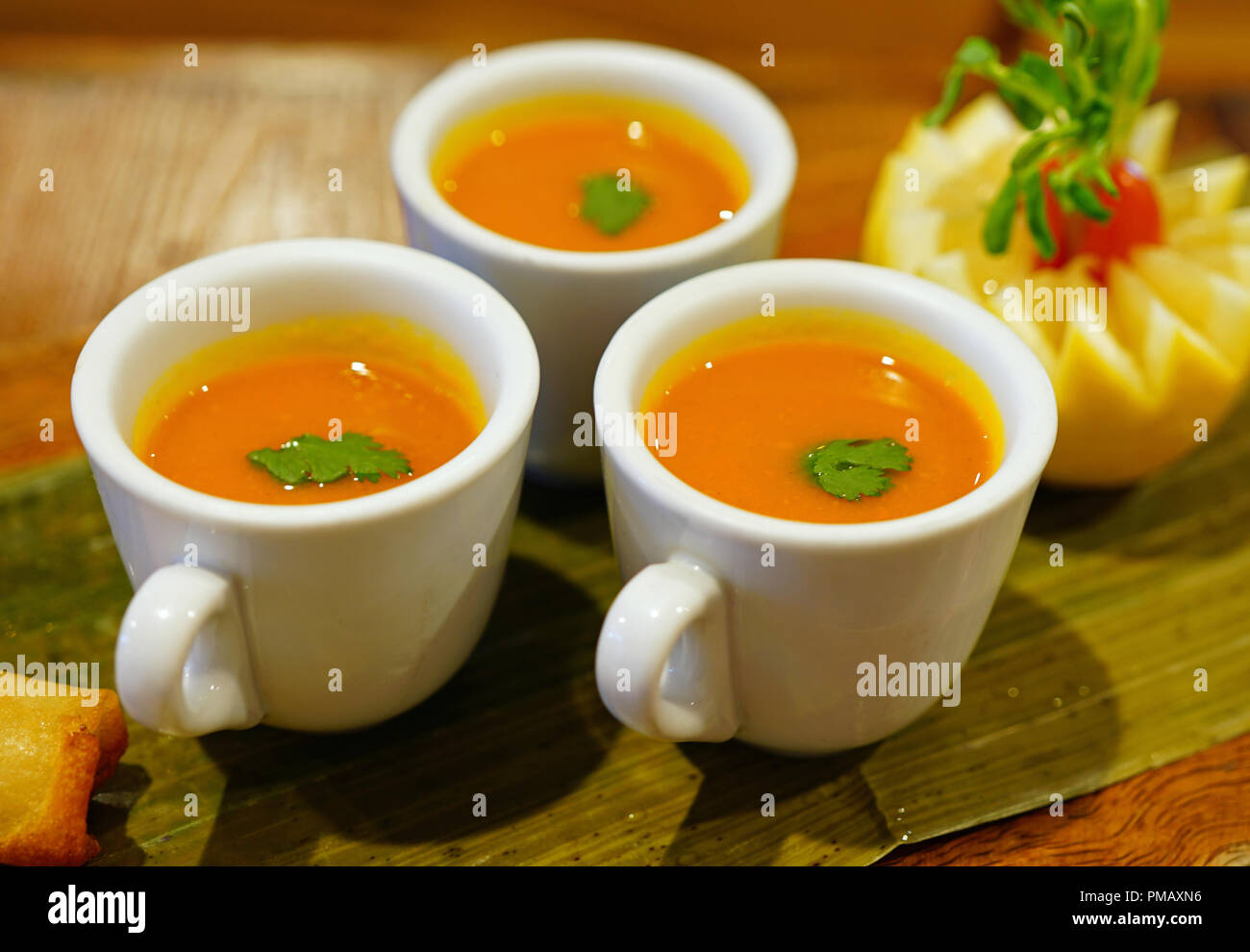 Vegan tomato soup in mini coffee cups and other vegan appetizers served ...