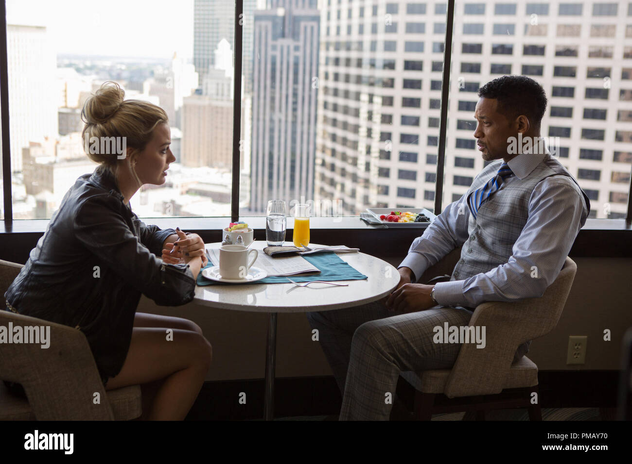 L R Margot Robbie As Jess And Will Smith Stars As Nicky In Warner Bros Pictures Heist Film