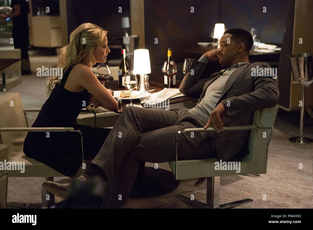 L R Margot Robbie As Jess And Will Smith Stars As Nicky In Warner Bros Pictures Heist Film