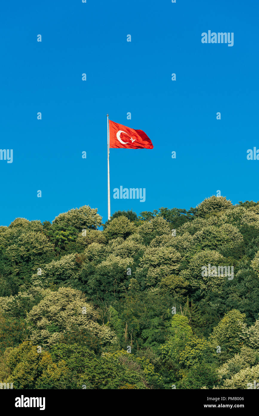 Turkish flag waving in blue sky Stock Photo - Alamy