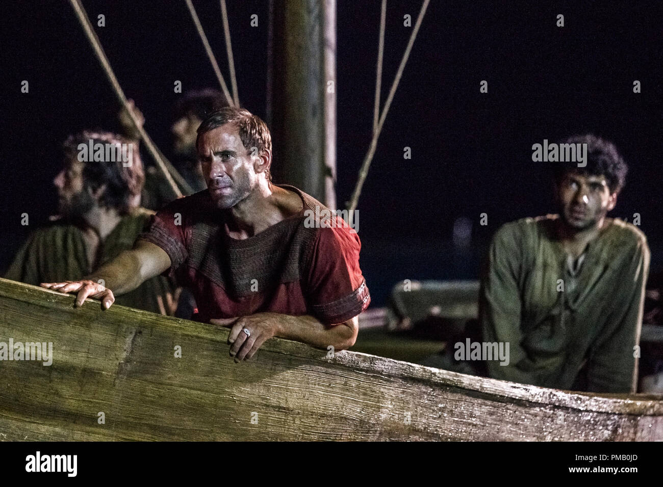 Clavius (Joseph Fiennes) and the apostles fish fruitlessly at night on ...