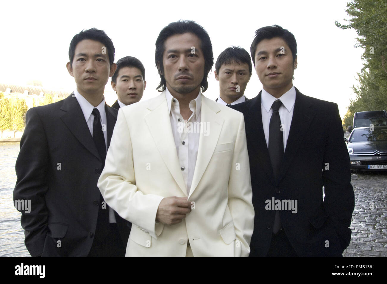 Hiroyuki Sanada (center) stars as 'Kenji', flanked by his Triad ...