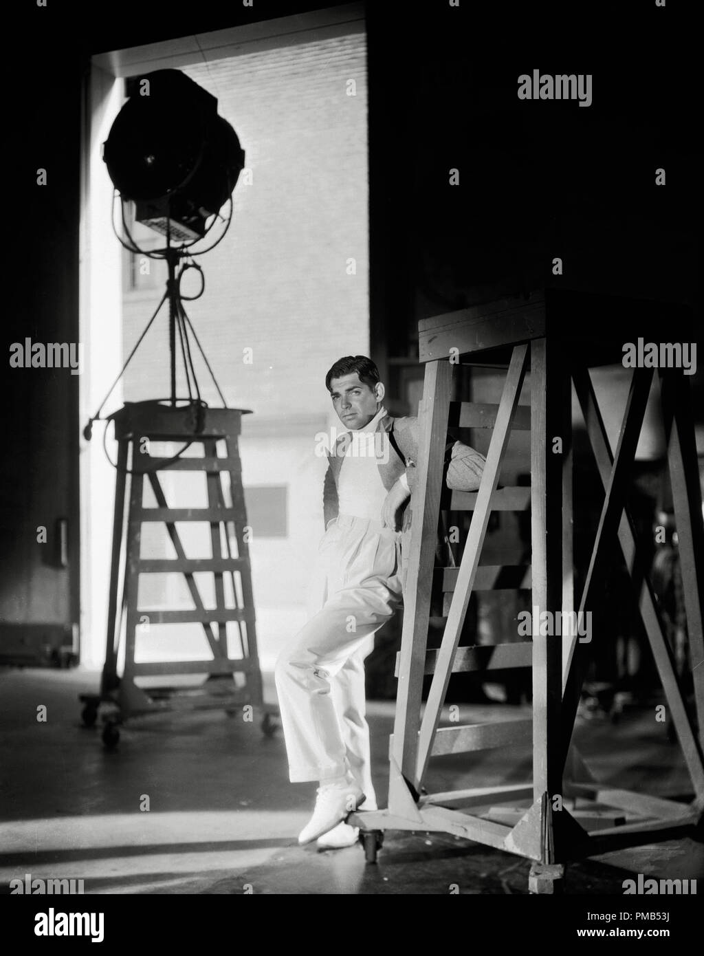 Clark Gable poses in a sound stage, circa 1931 File Reference # 33371 ...