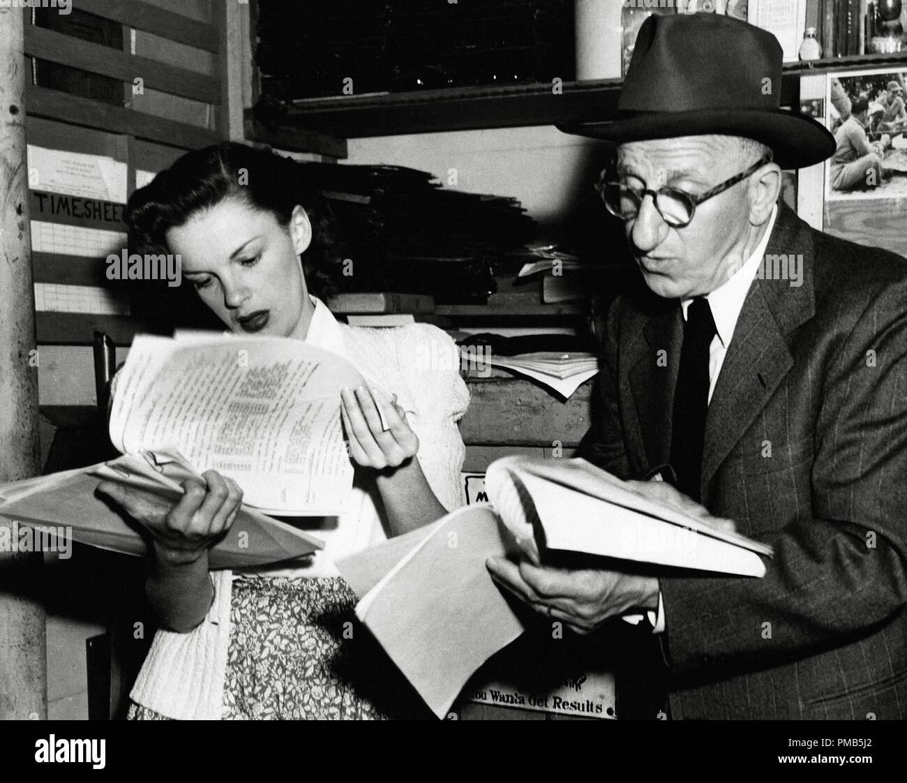 Judy Garland and Jimmy Durante going over their radio scripts for "Dick ...
