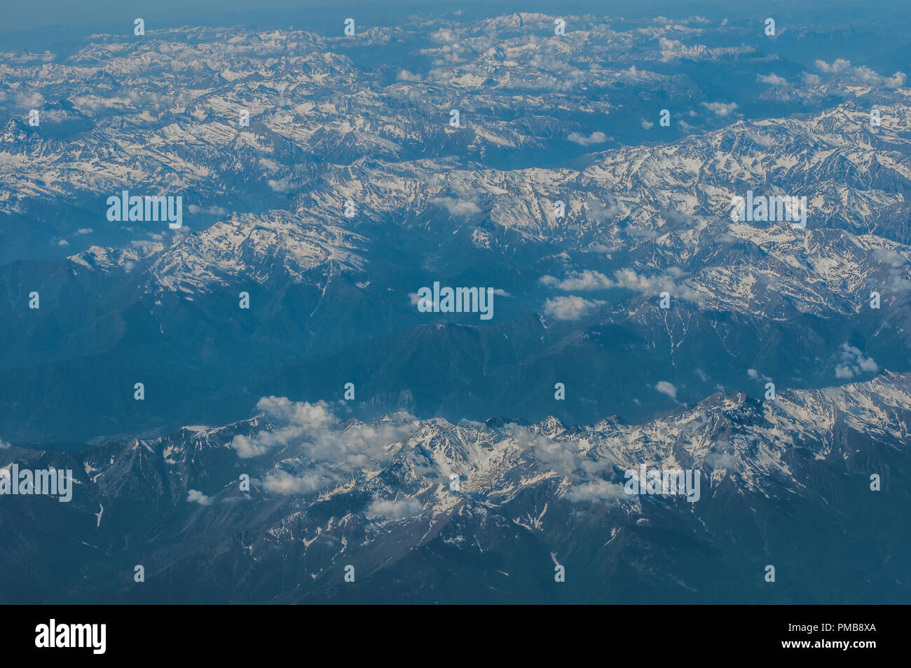 Aerial view of Swiss alps from Airplane Stock Photo - Alamy