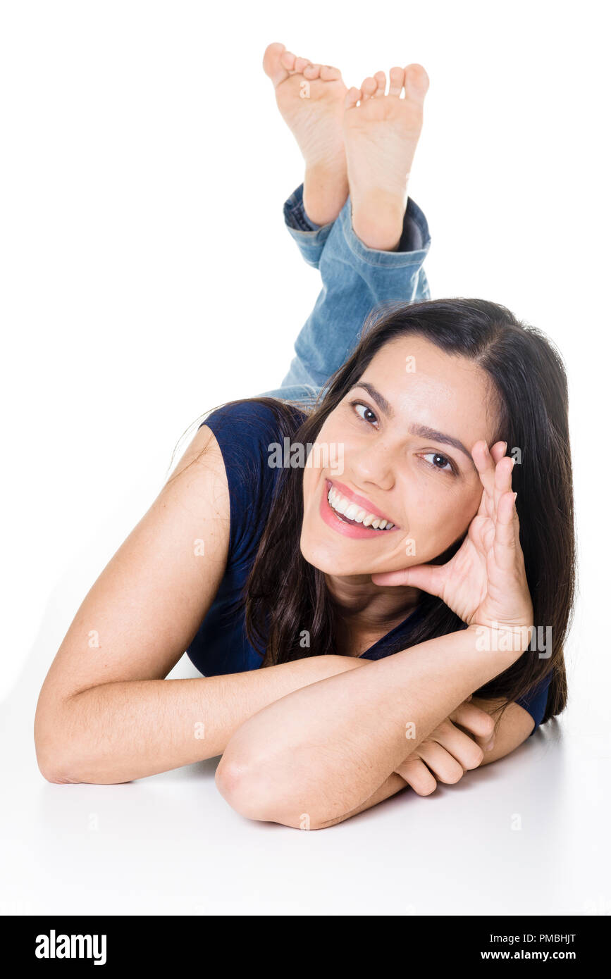 Close portrait of a lovely brunette lying down Stock Photo - Alamy