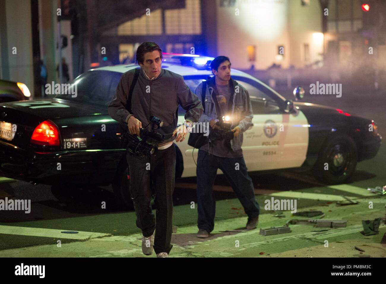 Jake Gyllenhaal as Lou Bloom and Riz Ahmed as Rick in NIGHTCRAWLER ...
