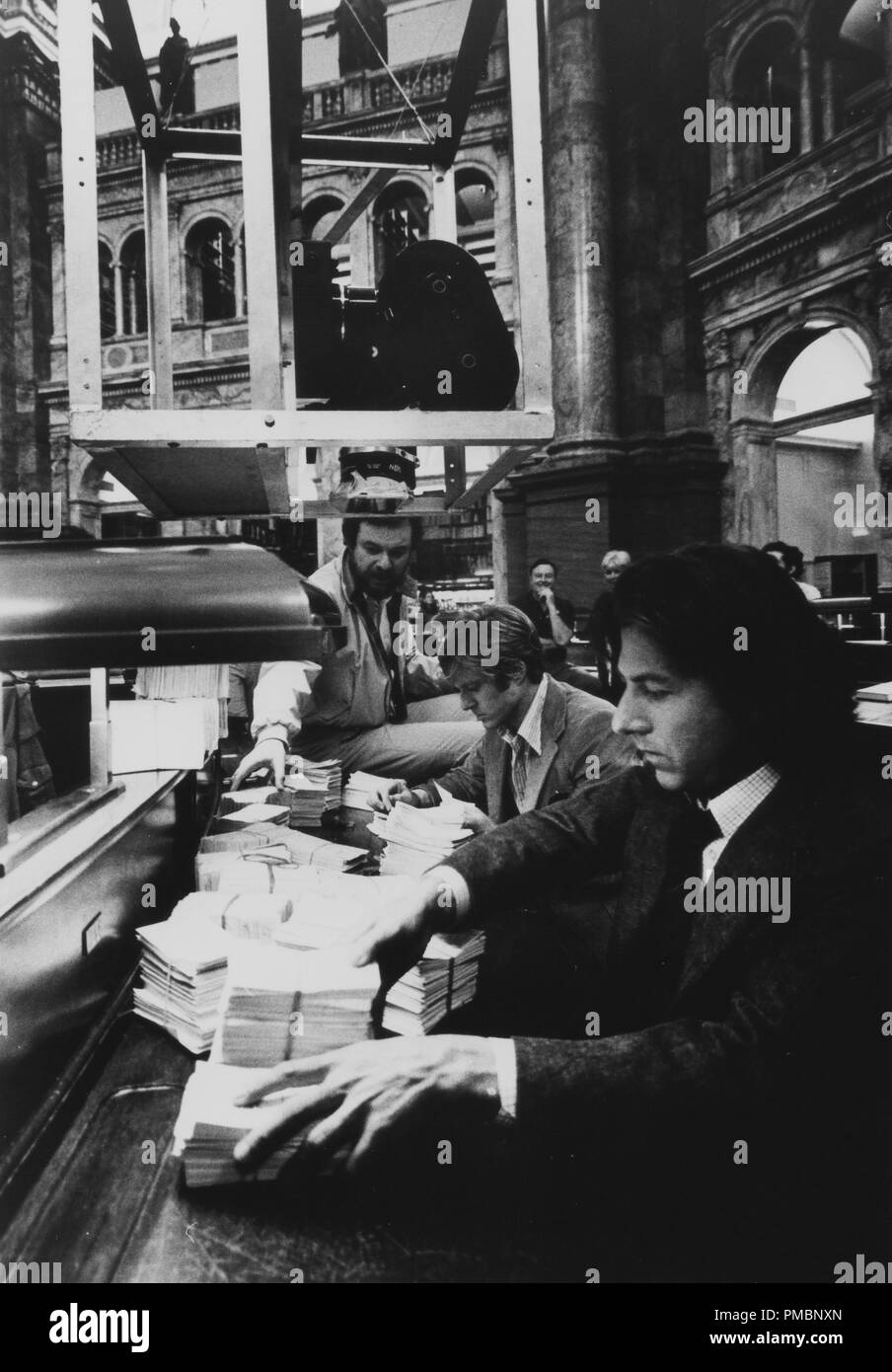 Director Alan J. Pakula, Robert Redford and Dustin Hoffman on the set ...