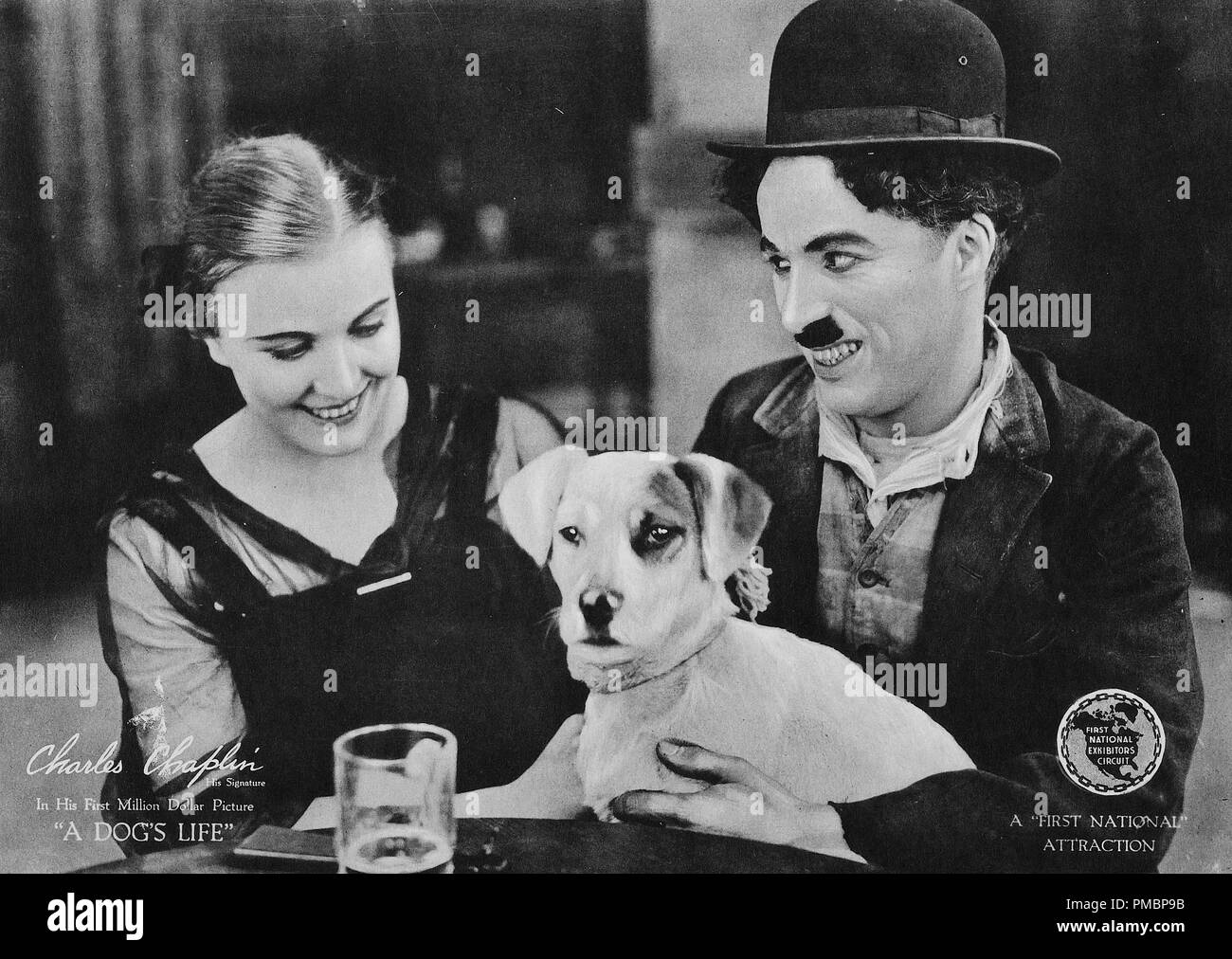 Edna Purviance and Charles Chaplin in "A Dog's Life" directed by ...