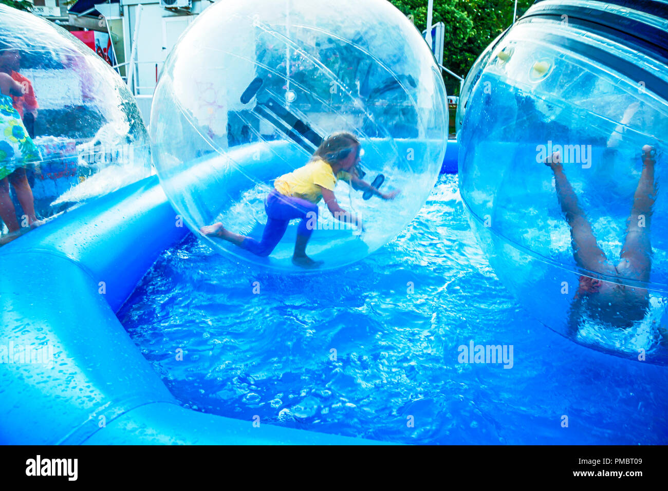 Child in zorb ball hi-res stock photography and images - Alamy
