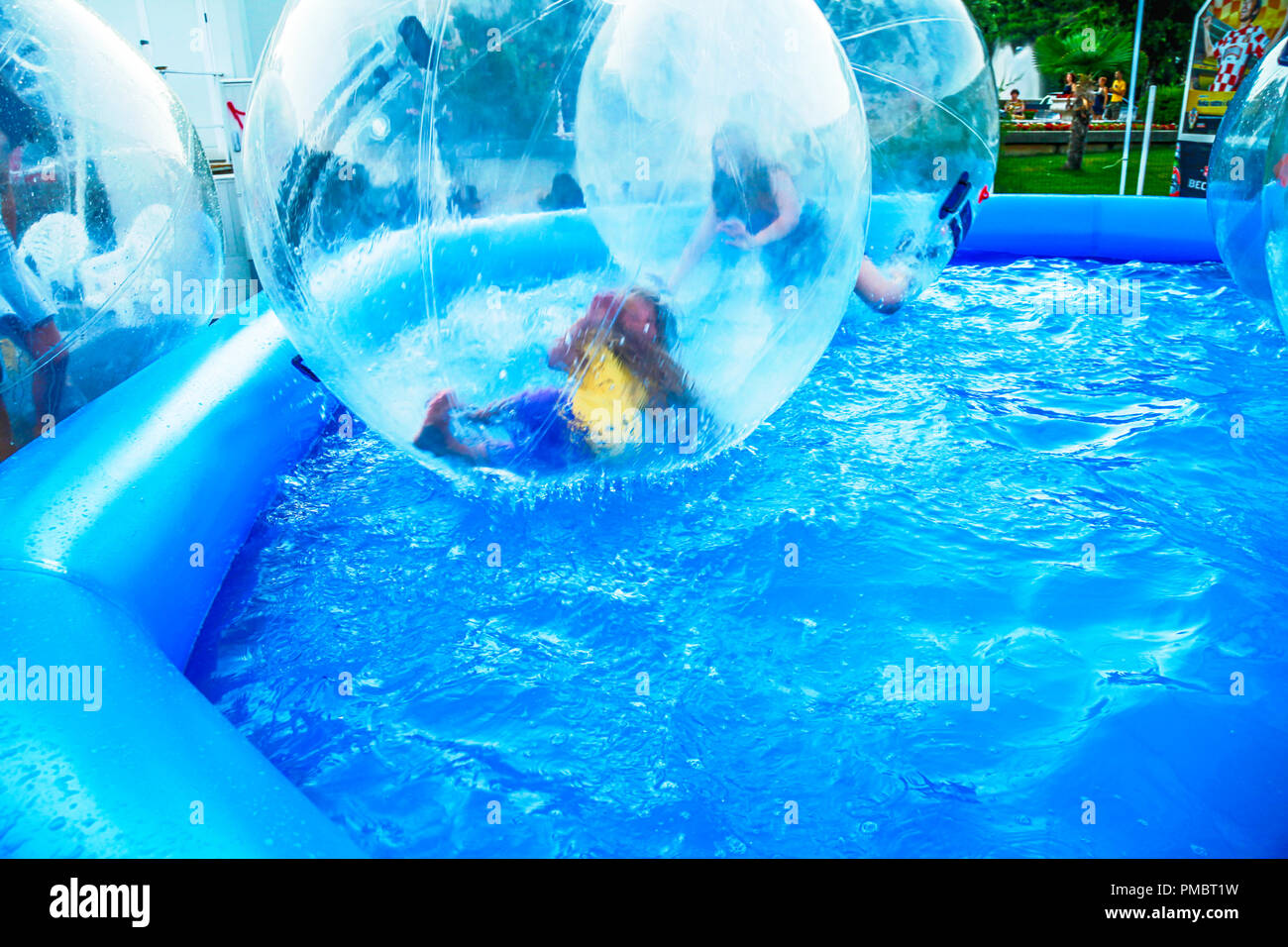 Child in zorb ball hi-res stock photography and images - Alamy
