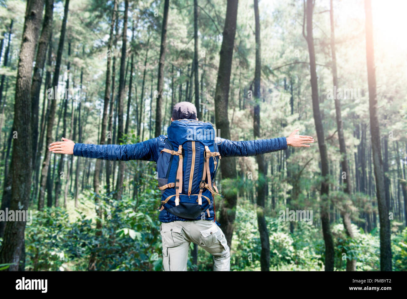 Happy man traveler hands raised hi-res stock photography and images - Alamy