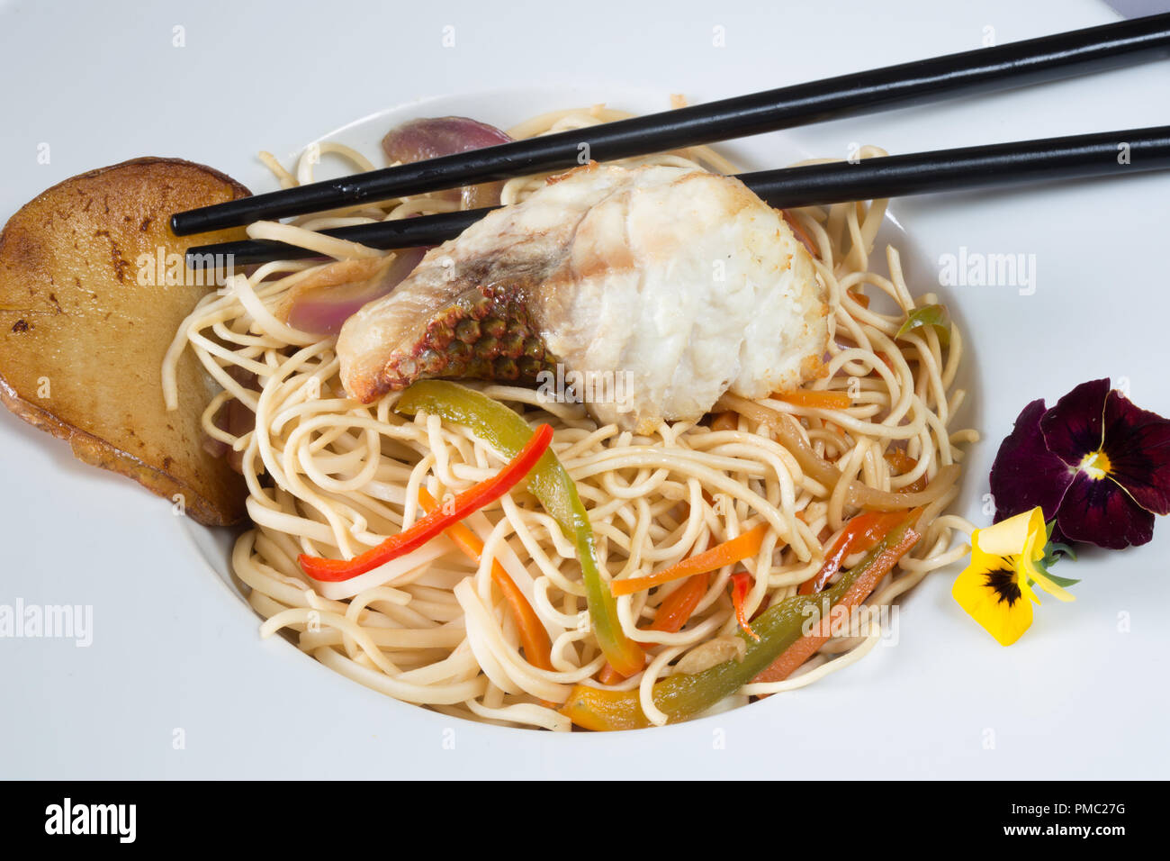 Middle eastern style dish of pan fried Red Snapper with stir fried ...