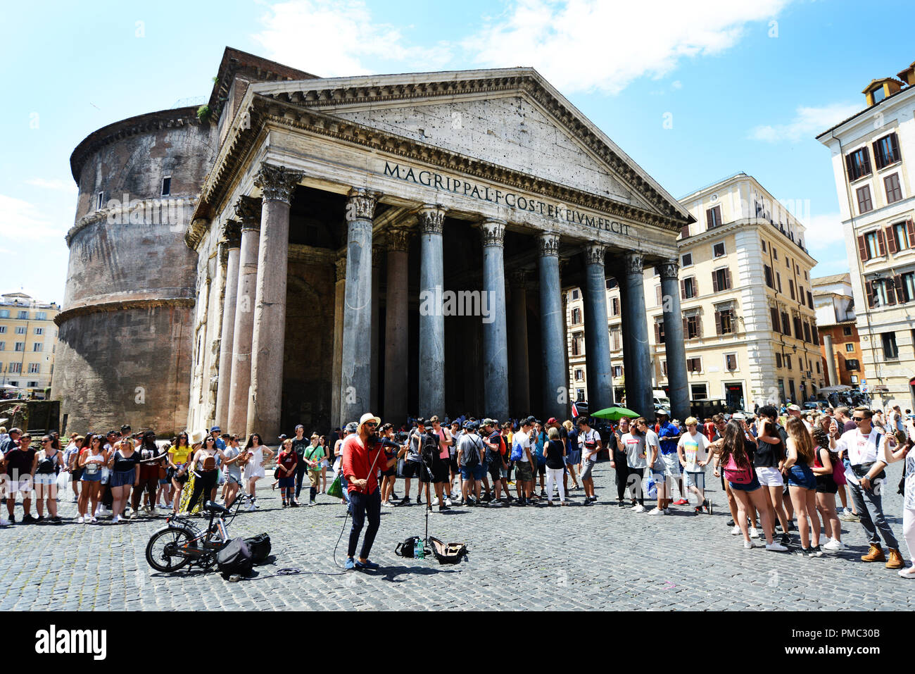A musician playing his violin by the Pantheon in Rome. An ancient Roman ...