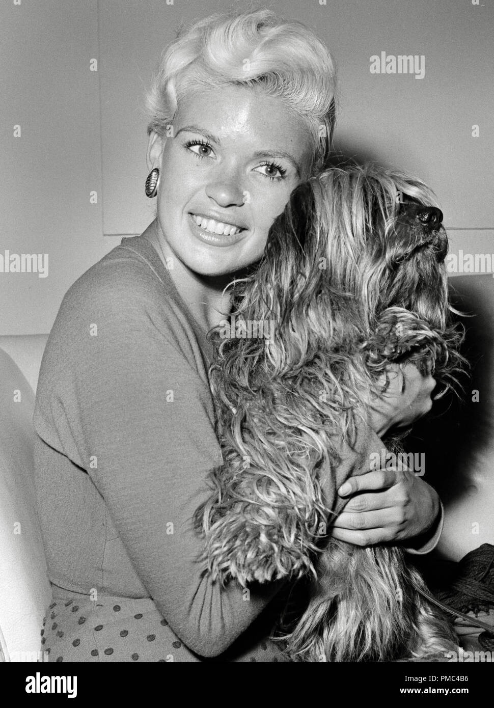 Jayne Mansfield holds a small dog circa 1957 File Reference # 33536 ...