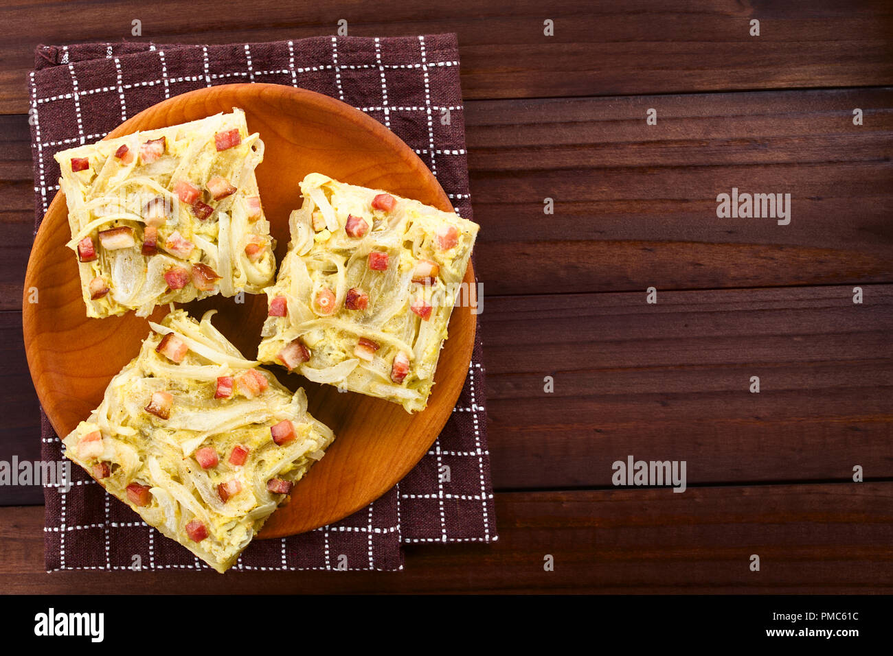Fresh homemade traditional German Zwiebelkuchen onion cake, a savory ...