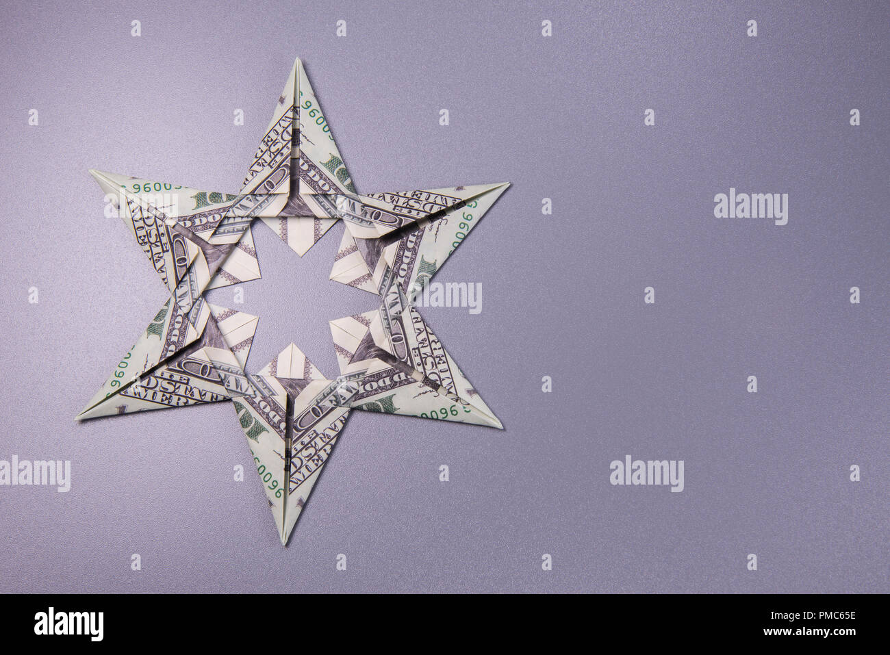 Money Origami snowflake Stock Photo - Alamy