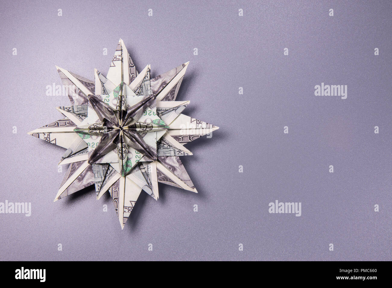 Money Origami snowflake Stock Photo - Alamy