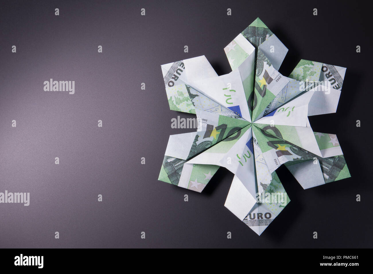 Money Origami snowflake Stock Photo - Alamy