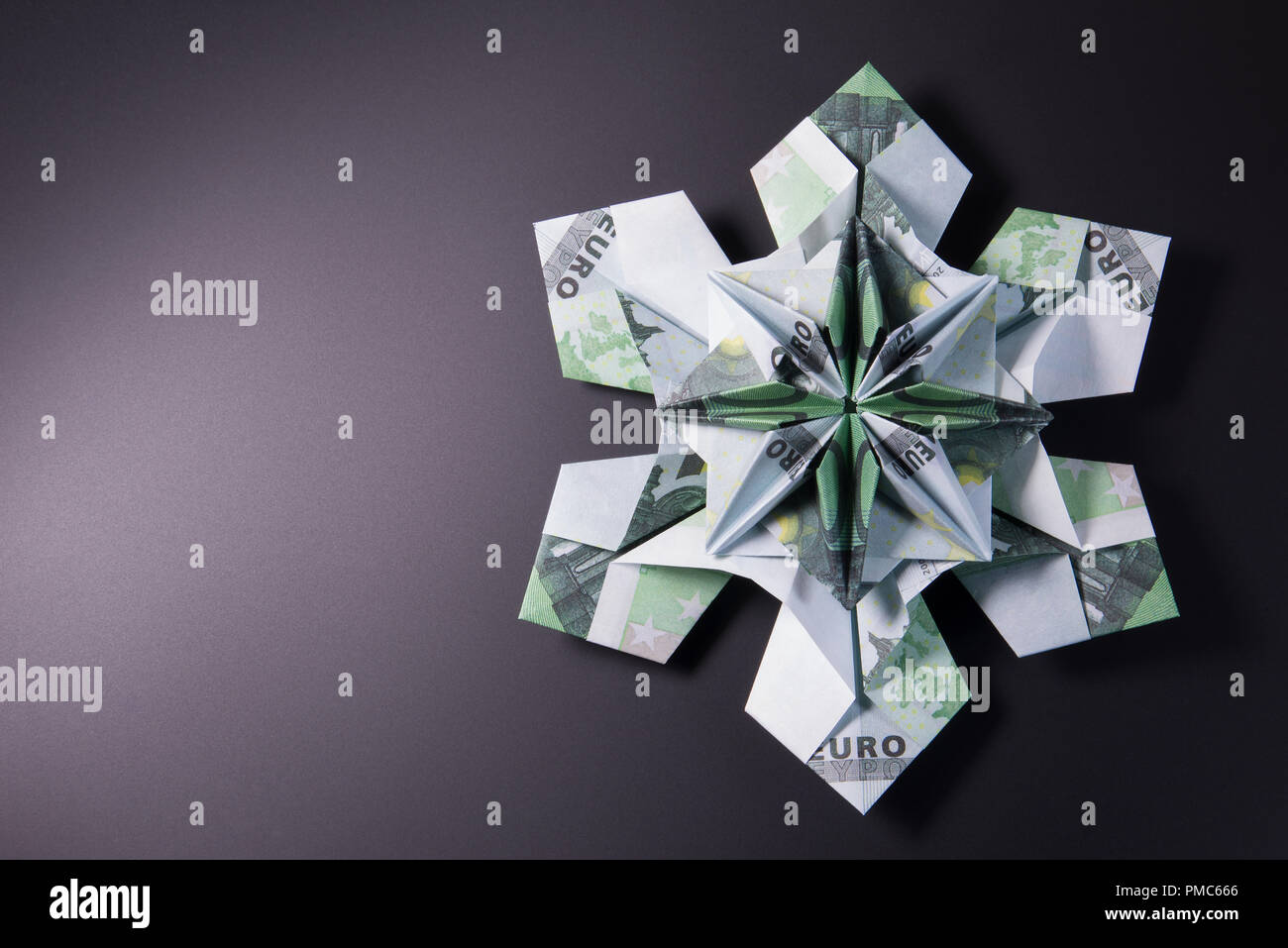 Money Origami snowflake Stock Photo - Alamy