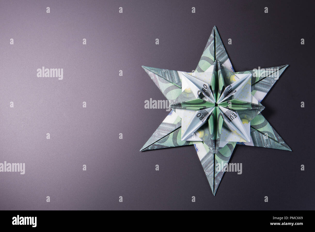 Money Origami snowflake Stock Photo - Alamy