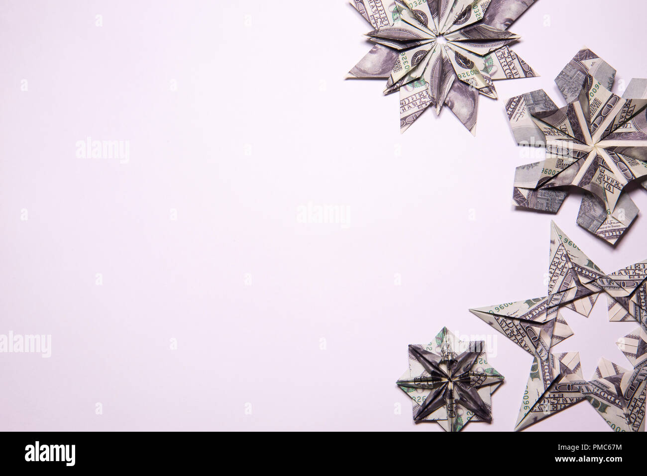 Money Origami snowflake Stock Photo - Alamy