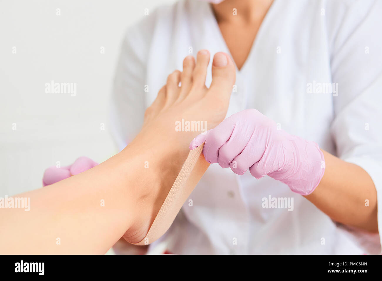 Patient on medical pedicure procedure visiting podiatrist.Podologic ...