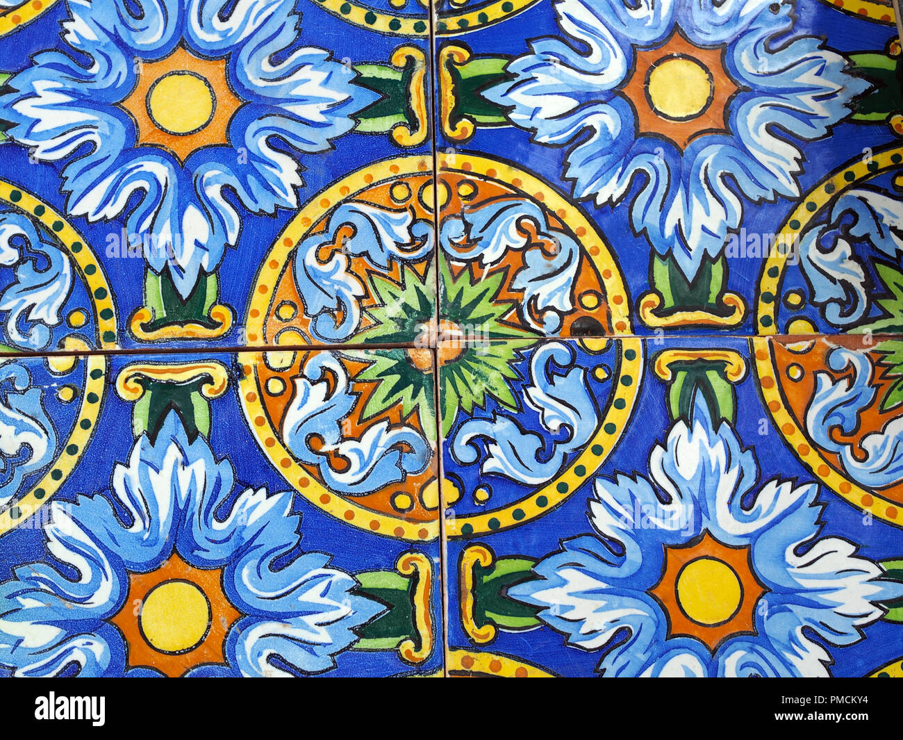 Detail of the traditional tiles from facade of old house. Decorative ...