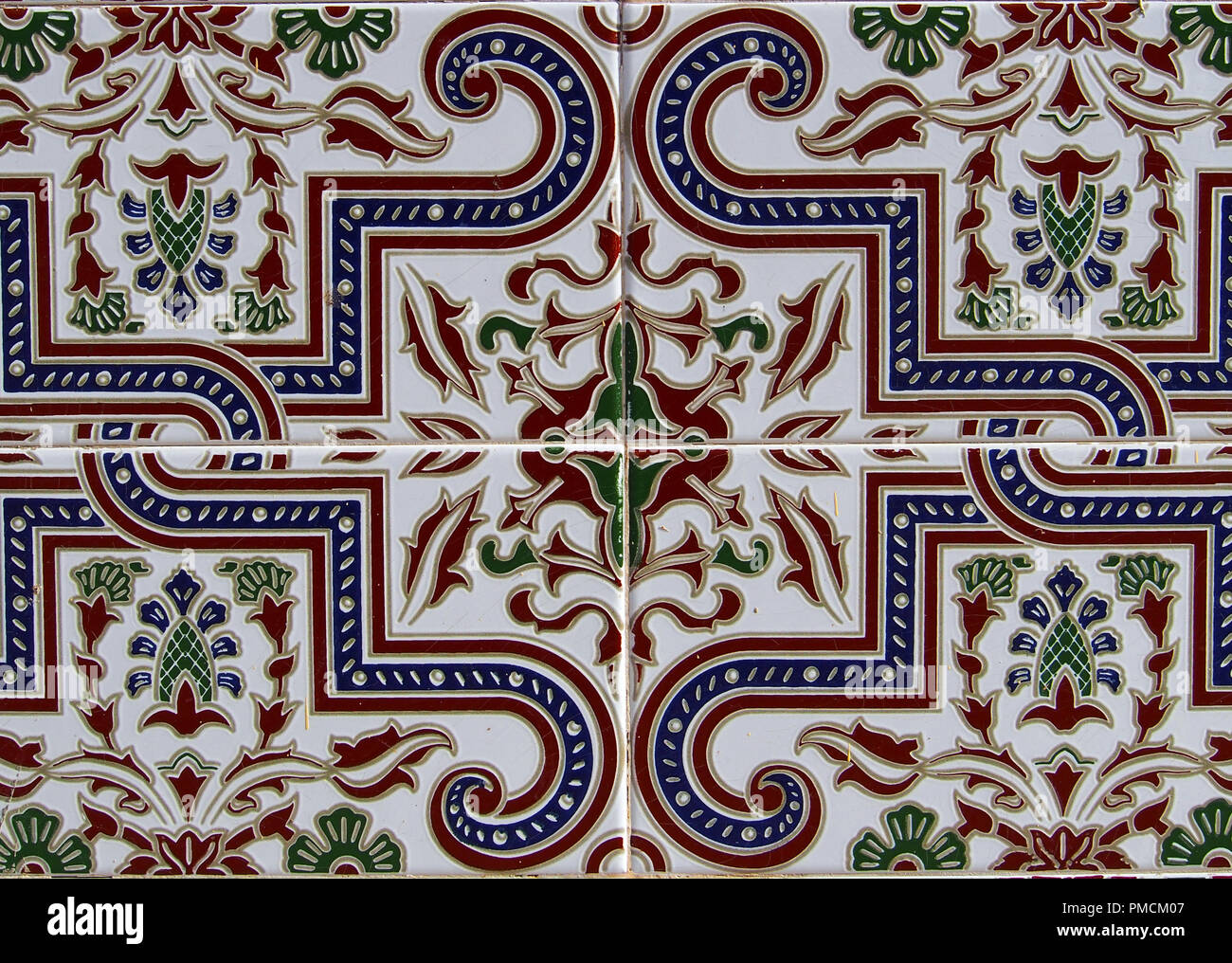 Detail of the traditional tiles from facade of old house. Decorative ...