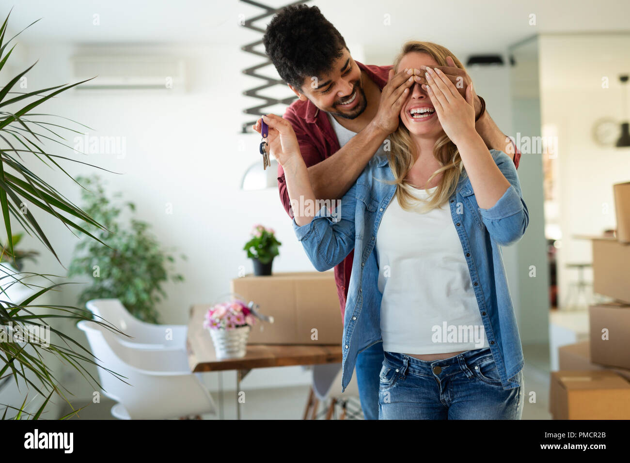 Happy couple moving house hi-res stock photography and images - Alamy