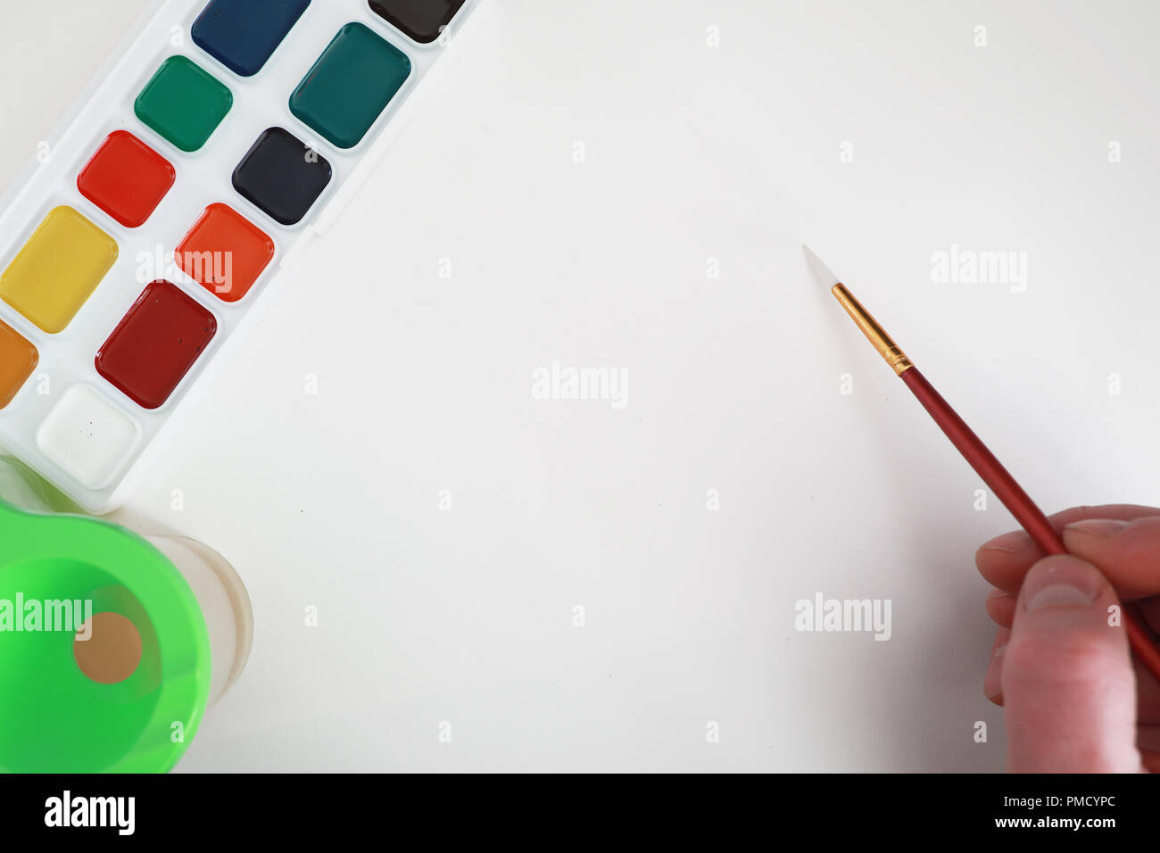 Drawing paints on a white sheet of paper Stock Photo - Alamy